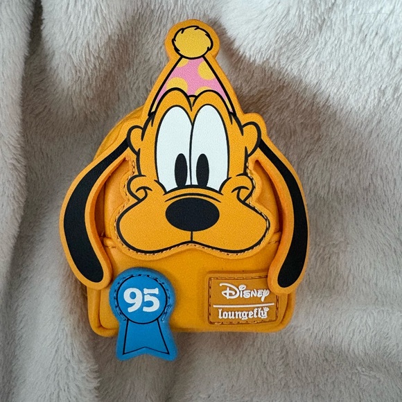 Loungefly | Bags | Loungefly Pluto 95th Birthday Bag Charm | Poshmark